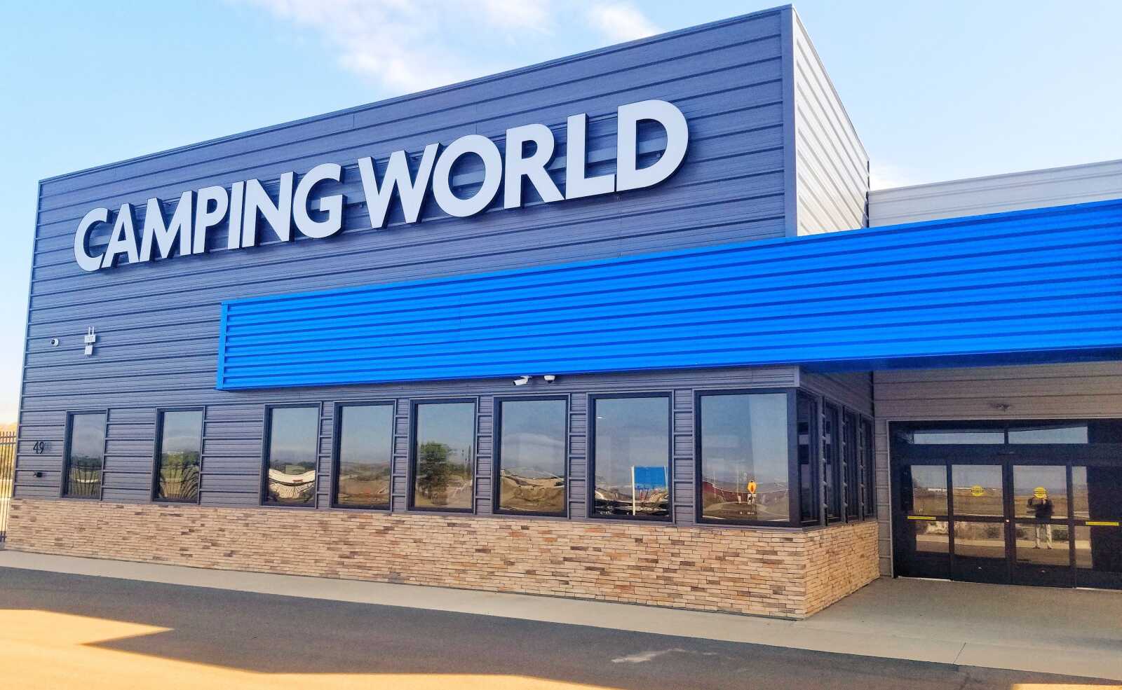Lights are on, but nobody's home — Camping World building in Scott Cou...