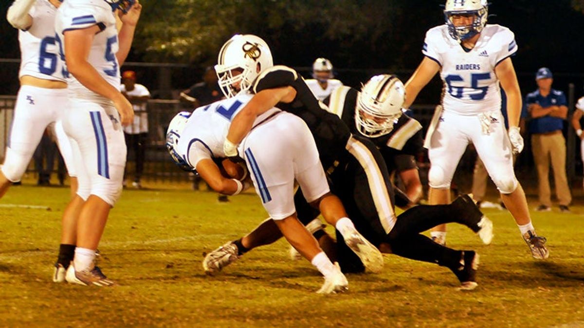 Straughn hands HA first loss in stunning upset, 35-21