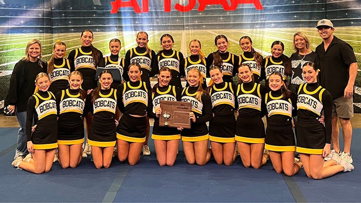 BUILDING ON A LEGACY: Opp High School cheerleaders bring hom...