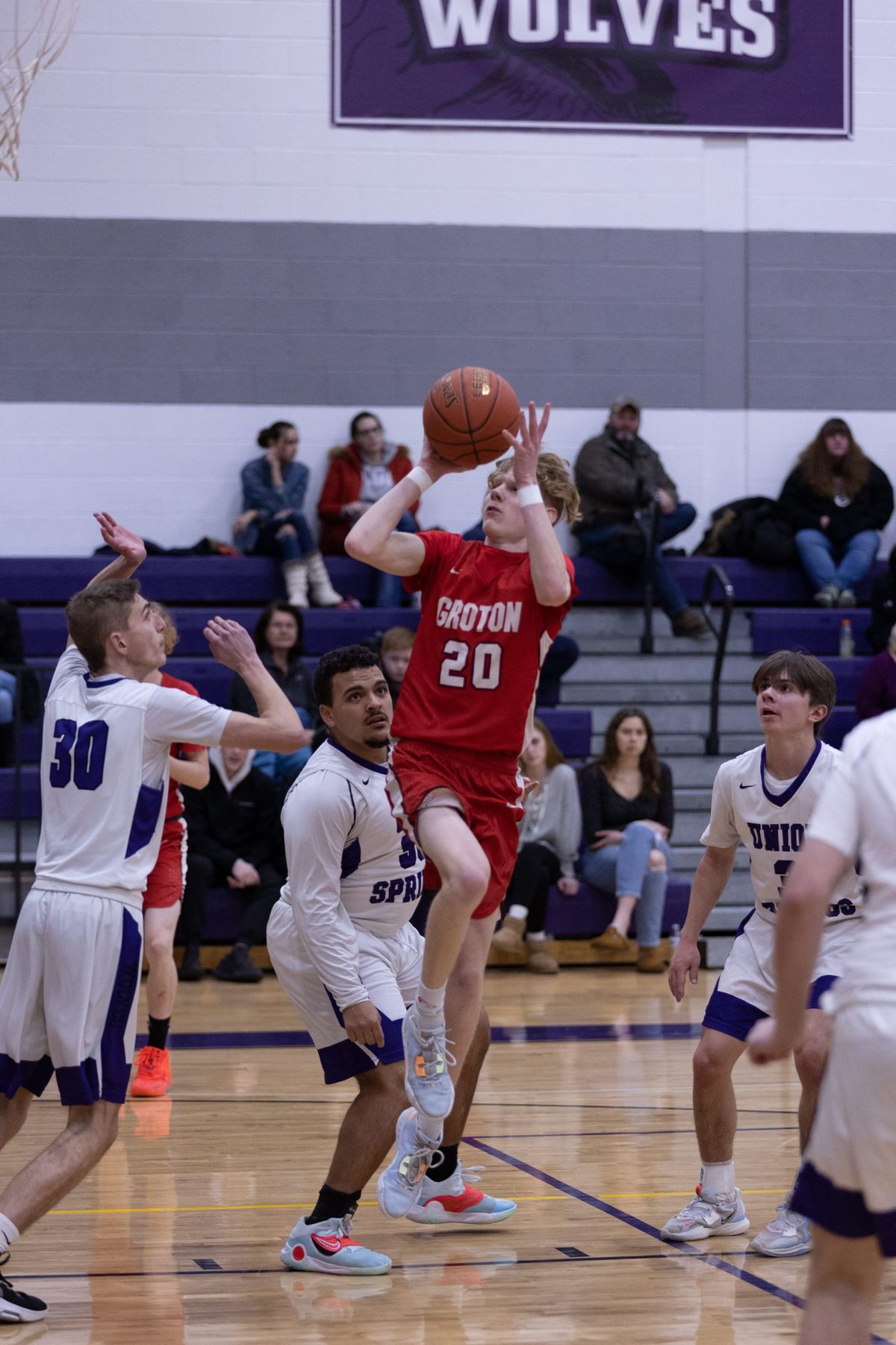 Groton boys hoops battling strong with new coach