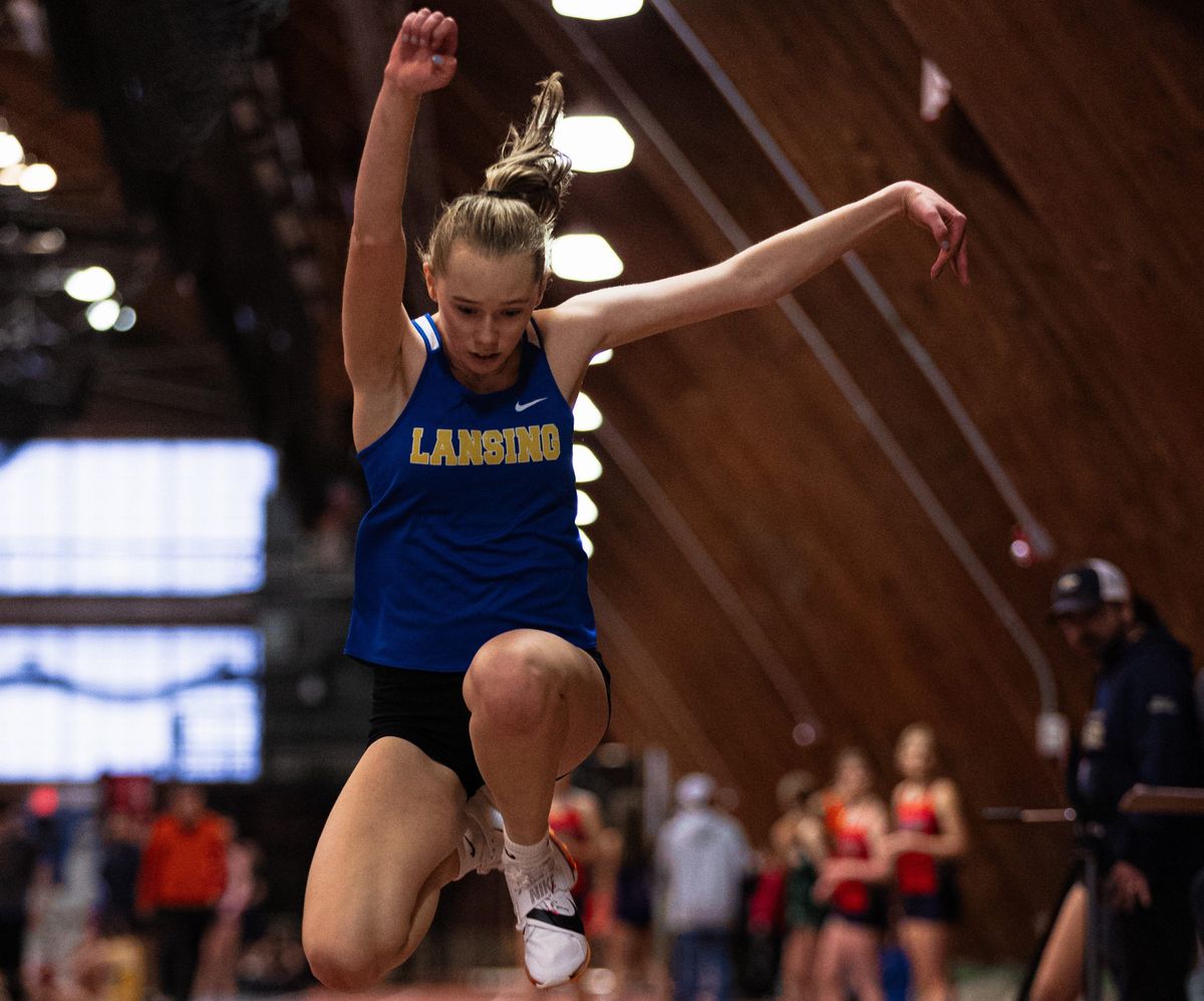 Lansing's Kristen Johnston breaks multiple school records