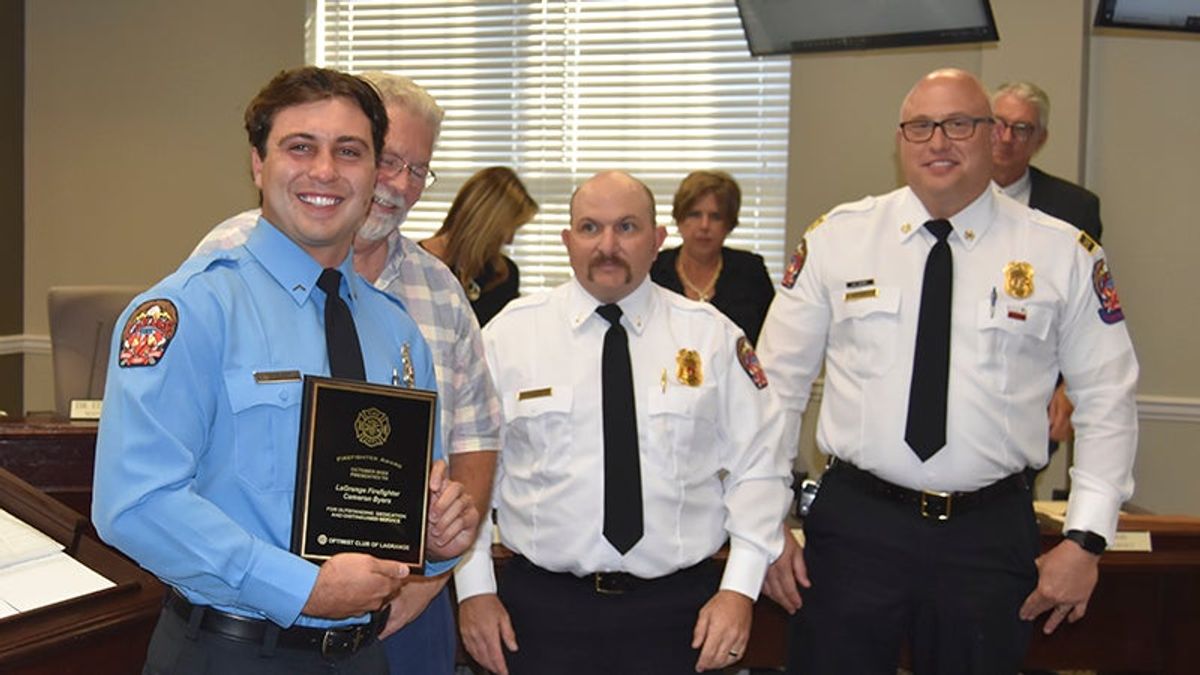 Optimists recognize police officer and city firefighter of t...