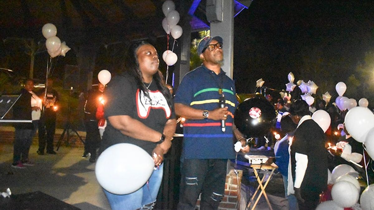 Candlelight vigil calls for action after 16-year-old's death