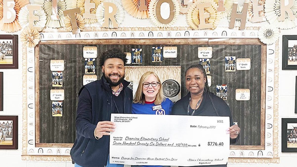 Lilburn elementary school donates to Clearview Elementary to...