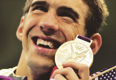 Phelps makes history at Olympics
