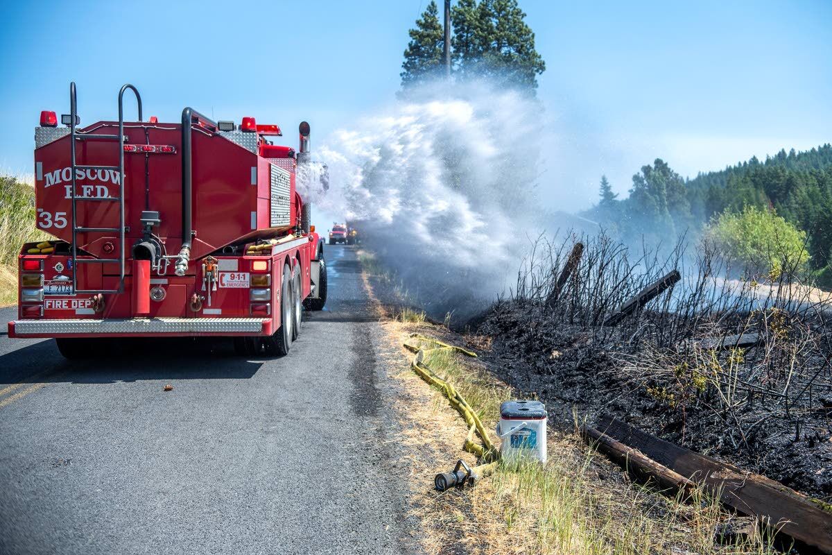 Photos: Small Viola fire extinguished after threatening two homes