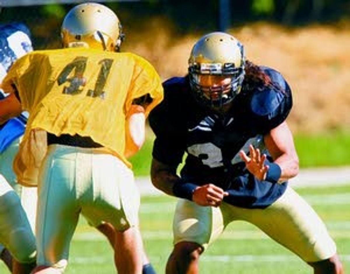 Dickson diving for tackles