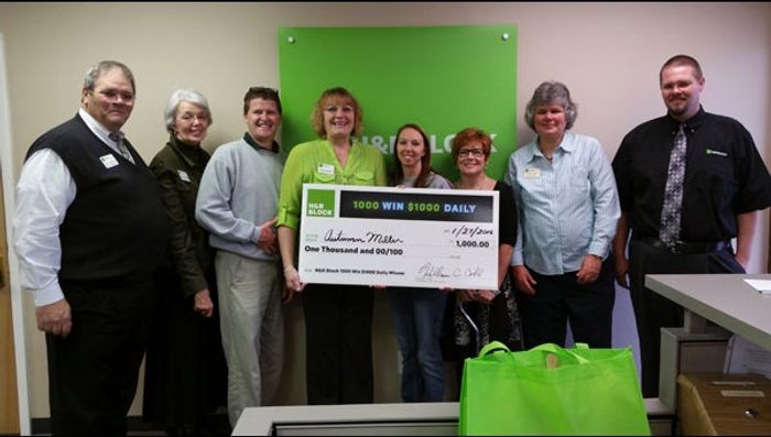 Local H&R Block office celebrates sweepstakes winners