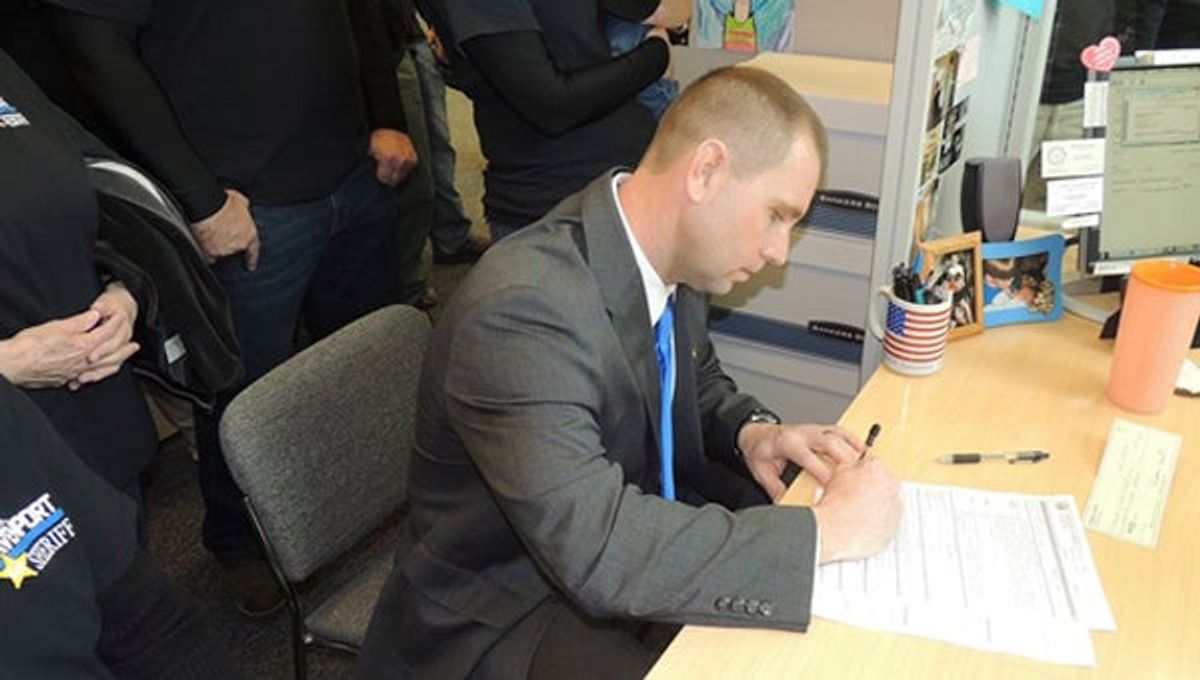 SIGN HERE