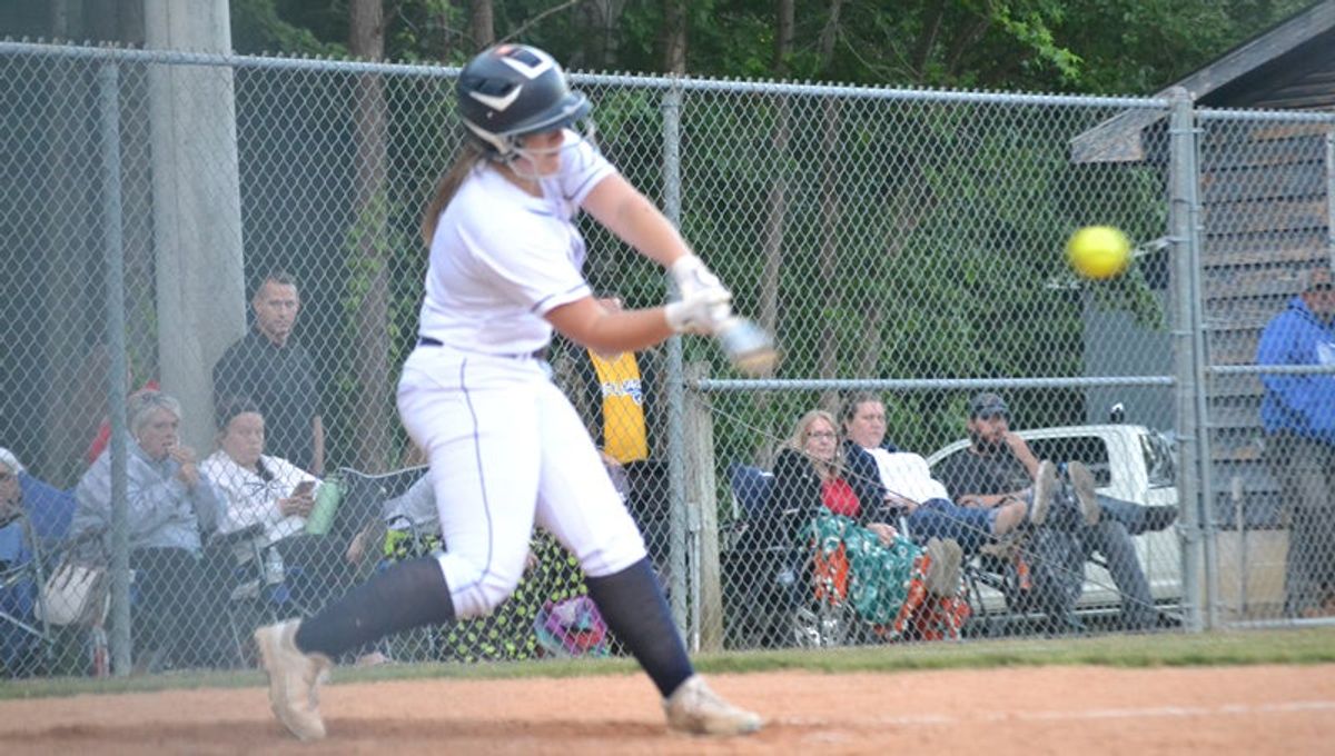Washington softball slides into fourth round