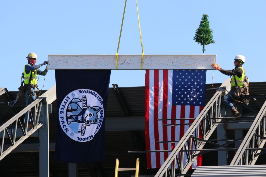 Raise that beam! BCS hosts “topping out” ceremony to celebra...