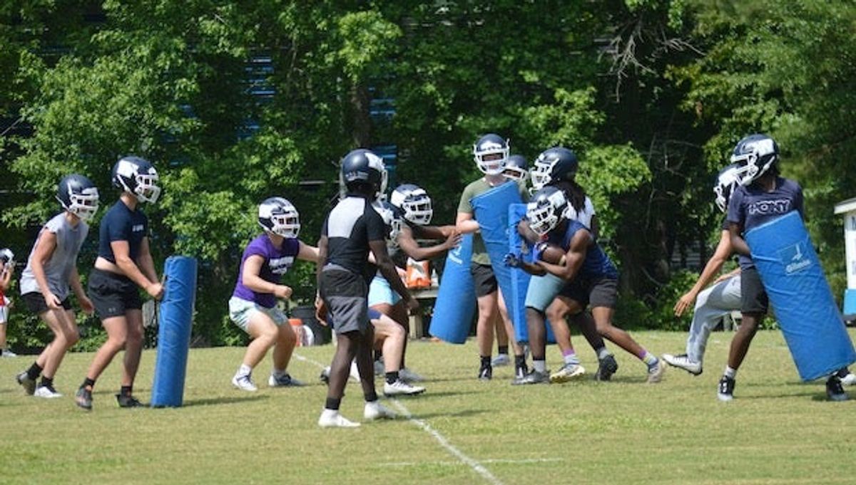 Taylor establishes culture during football practice