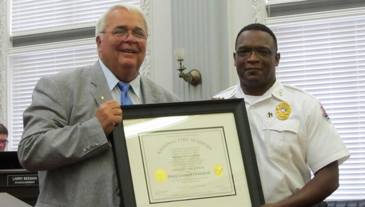 Police and fire director completes 4-year program