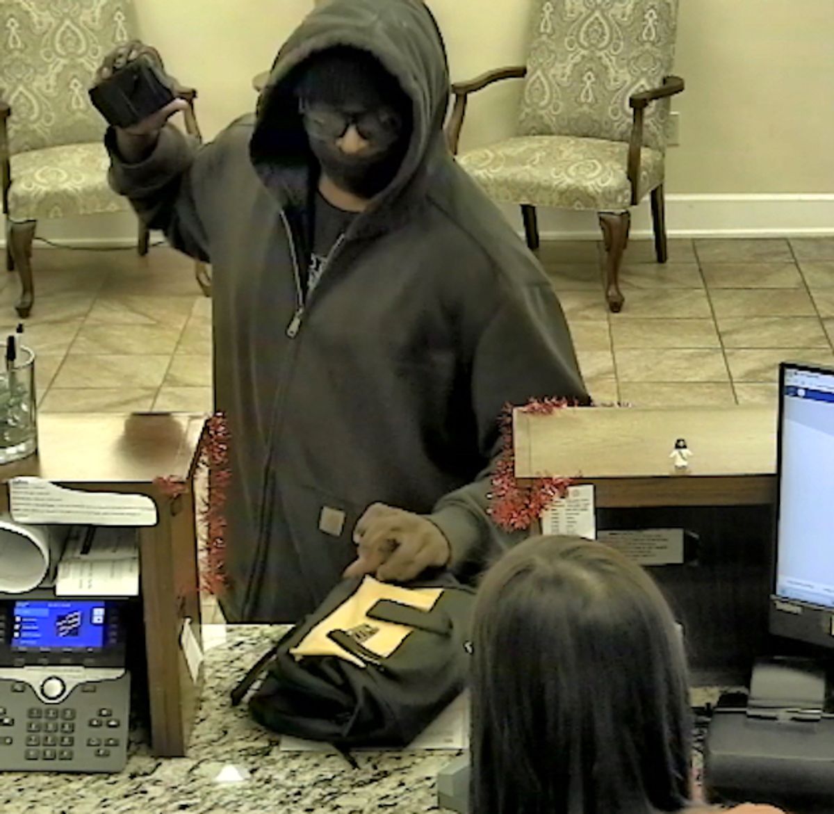 'Domestic terror': Zebulon bank robbery suspect nabbed in sh...