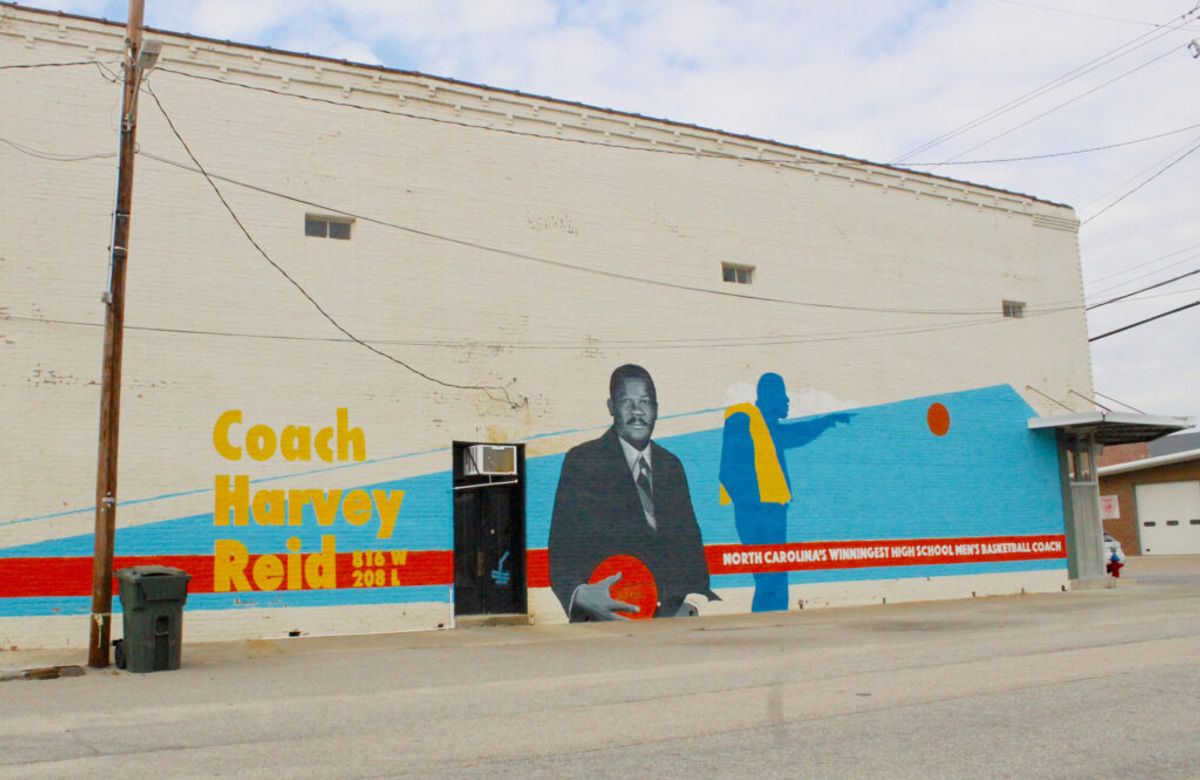 Elm City mural honors late coach Harvey Reid