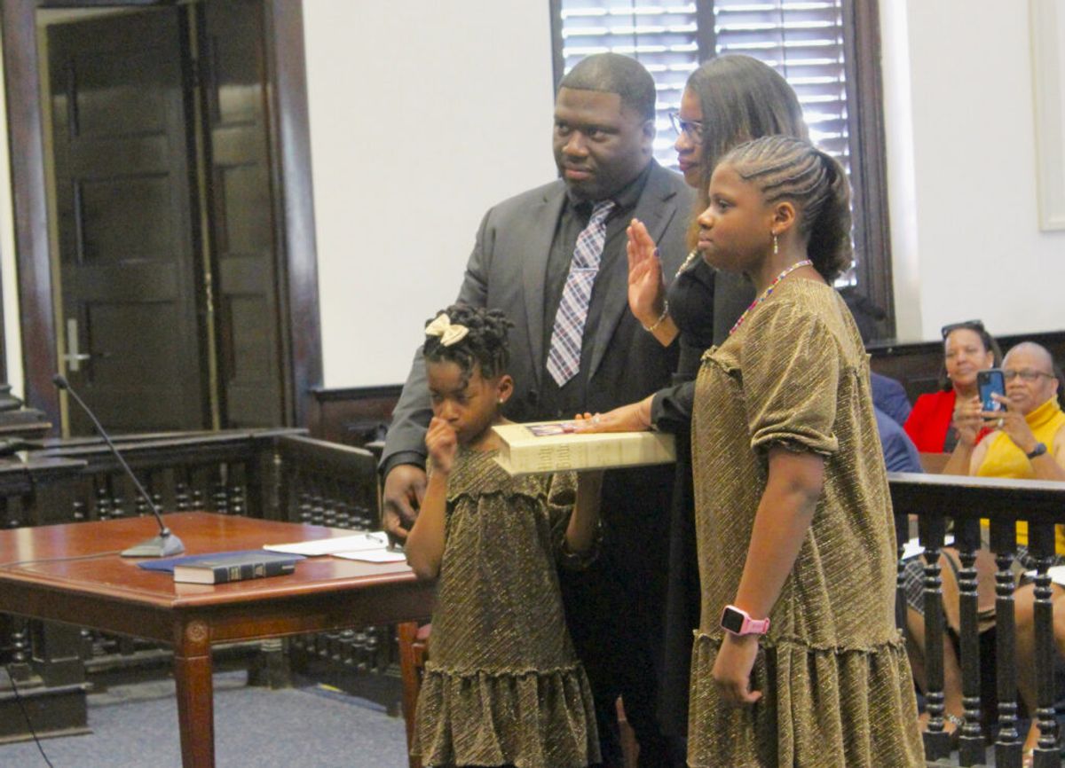 Slaughter sworn in as District Court judge
