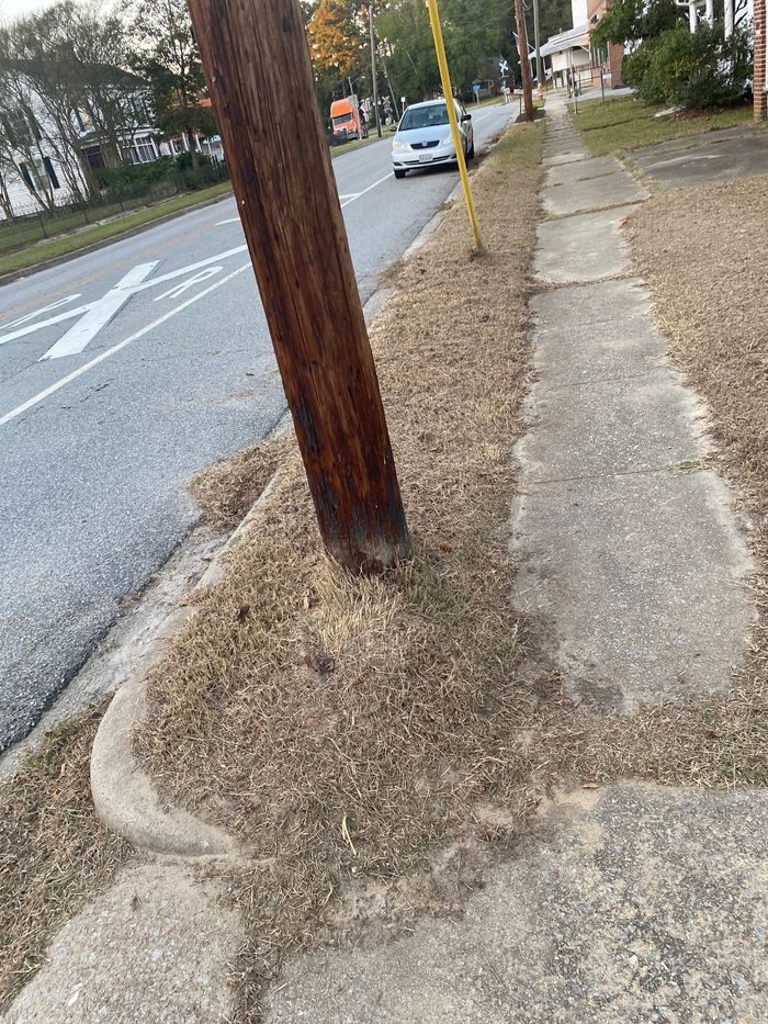 WAY TO GO! — Family 4 Eternity cleans up grounds adjoining Capron Post...