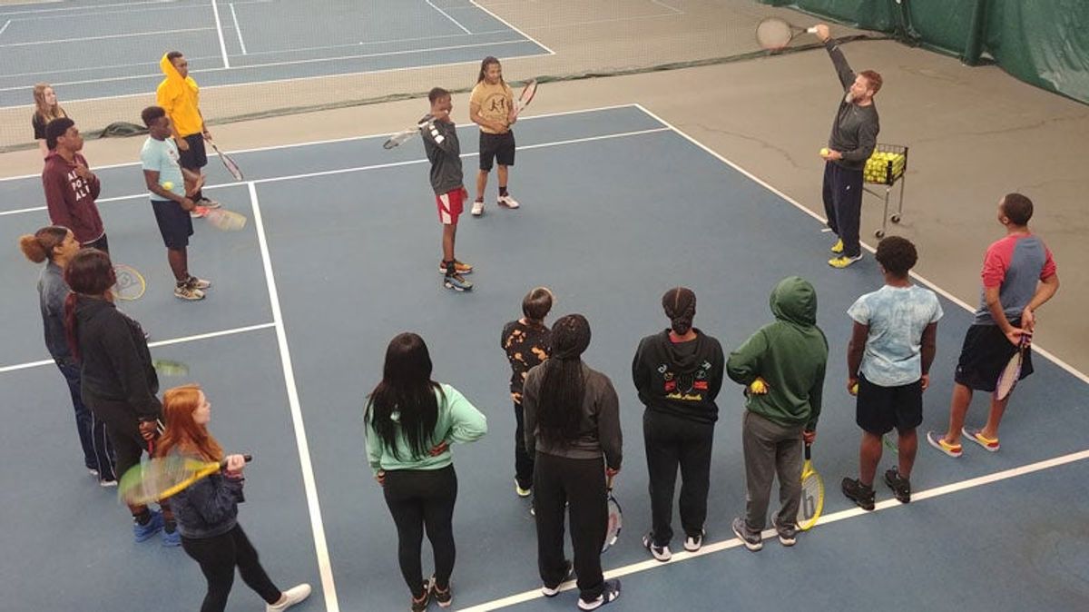 P.E. students learn tennis