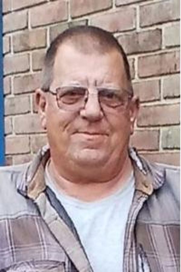 McGLOIN, TRACY E.