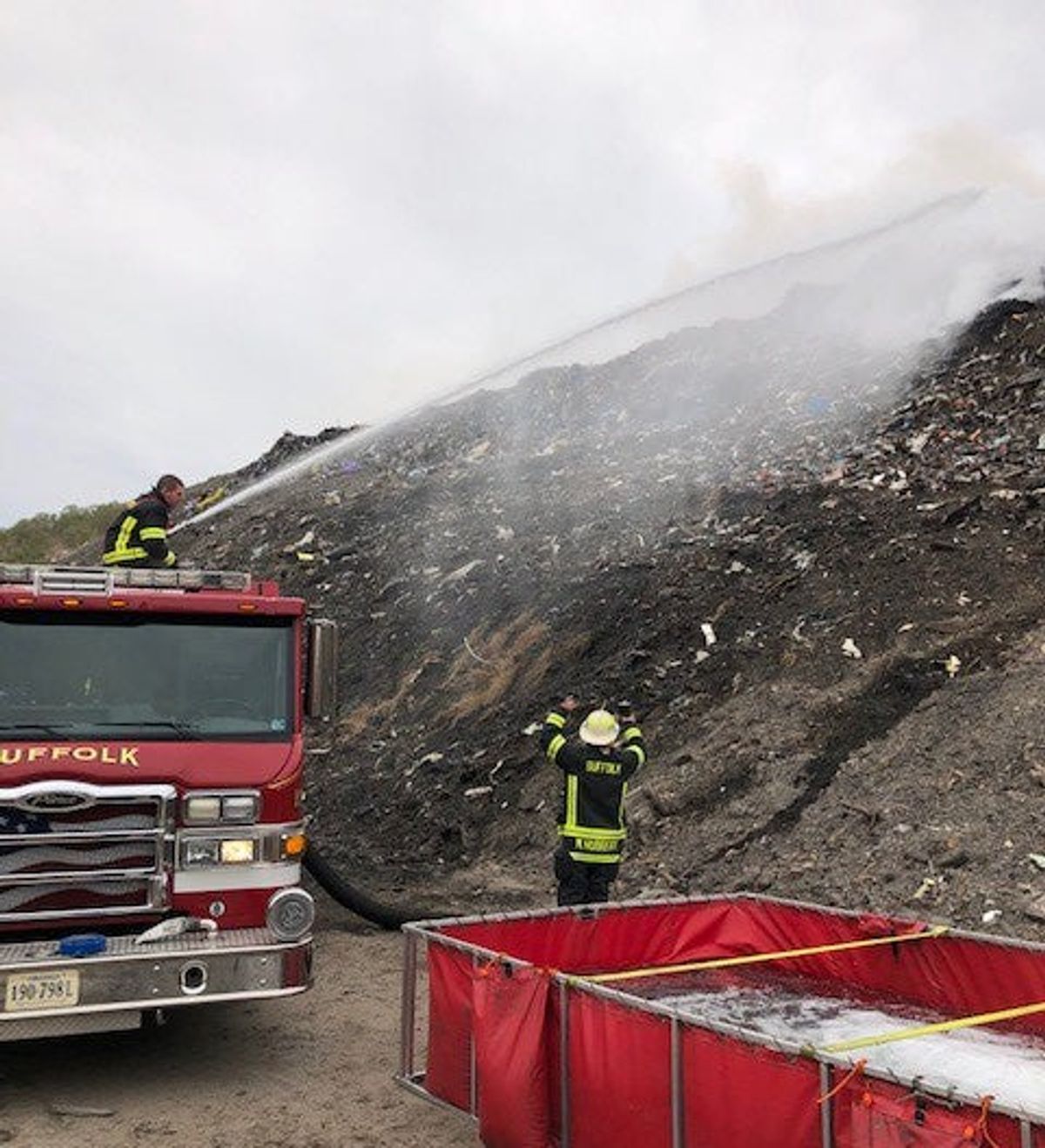 Crews clear scene of landfill fire