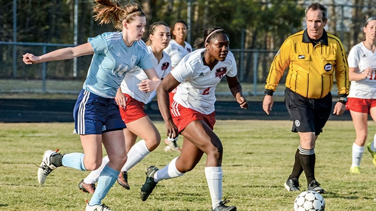 Rhiel's two goals help NR win