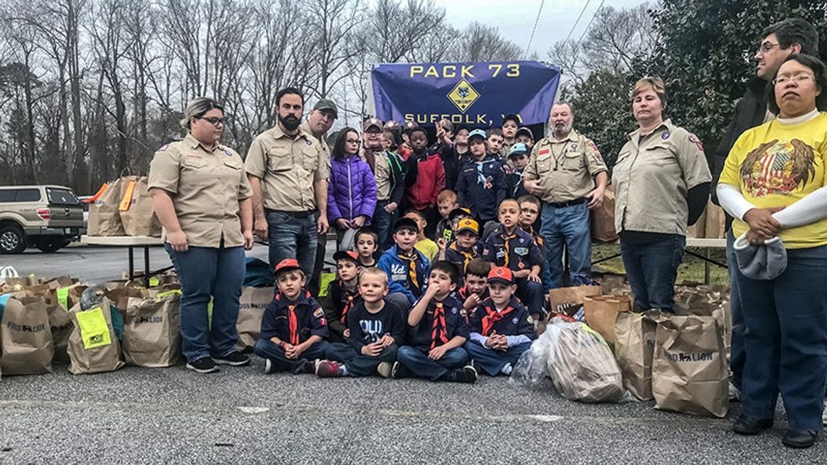 Cub Scouts serve Suffolk Community