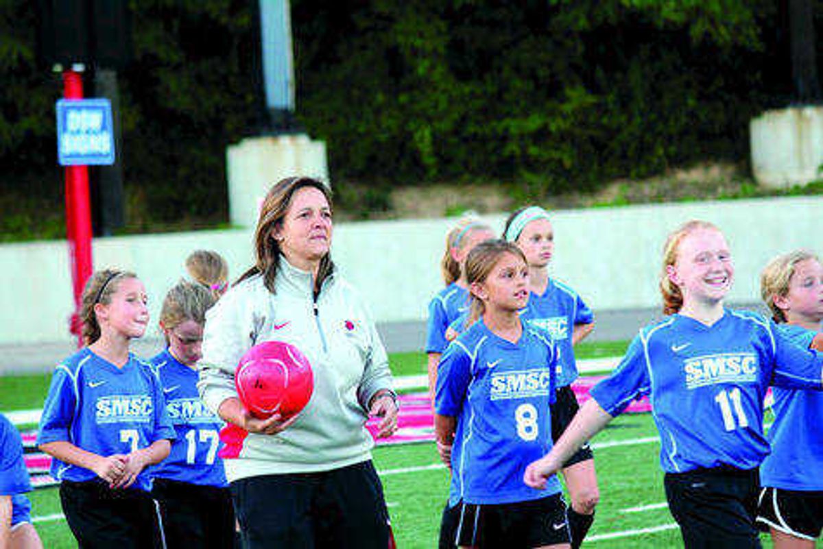 Soccer coach Heather Nelson coaches youth soccer club