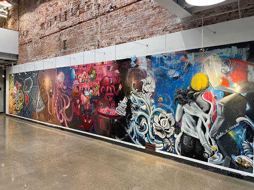 SEMO students painted Catapult’s newest mural: “Fever Dream”