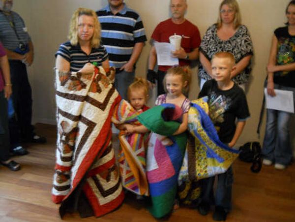 New Habitat homeowner takes keys on Lee Street