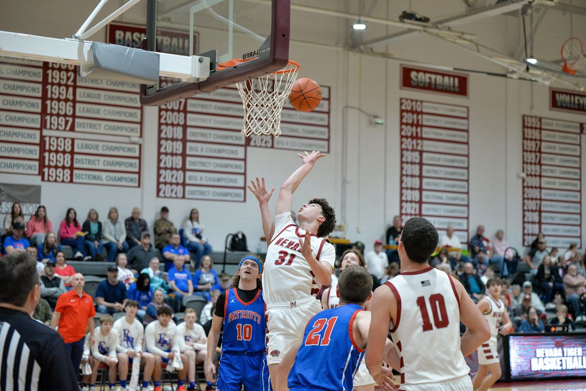 Tigers take firm command of Big 8 Conference race and top di...