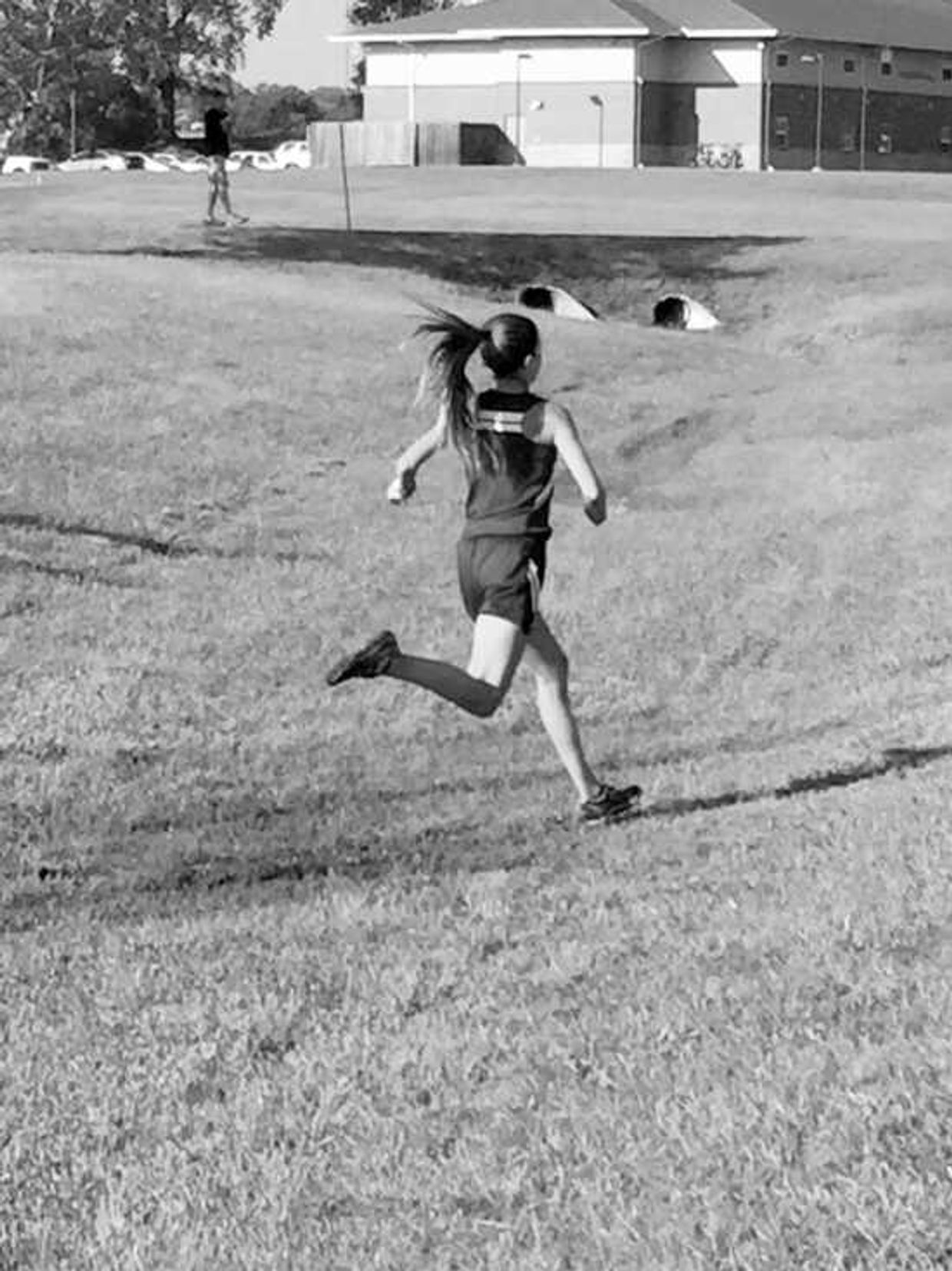 Nevada boys, girls place runner-up at Iola XC Invitational