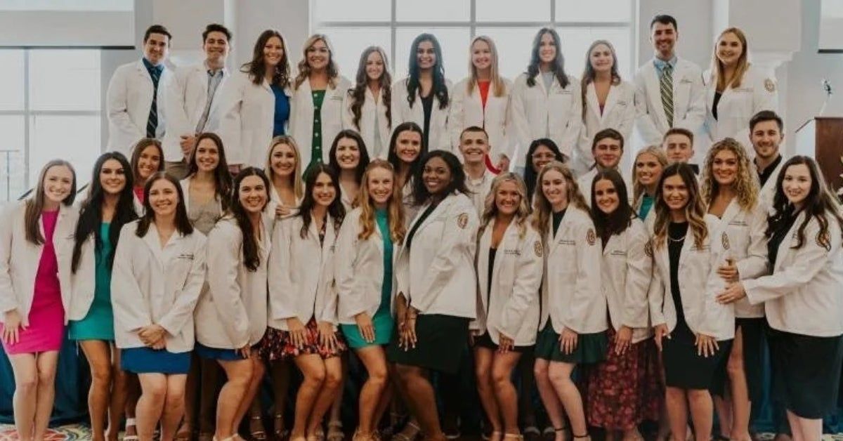 Hannah Bryant receives White Coat from Mississippi College Physician A...