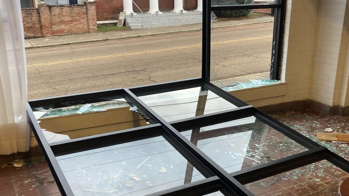 Broken window at The Open Market caused by winds, not vandals