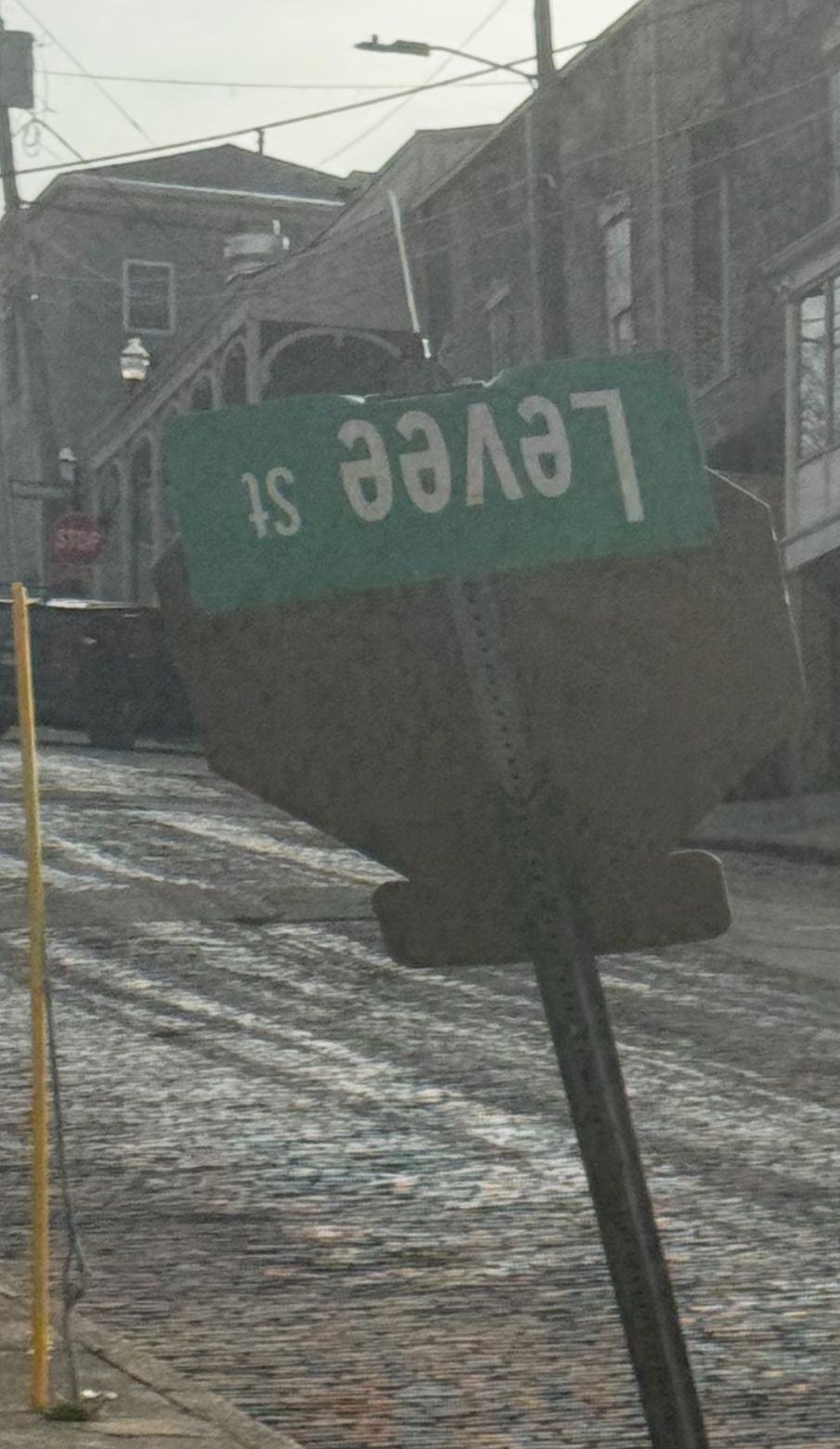 PLEASE FIX: Levee Street sign