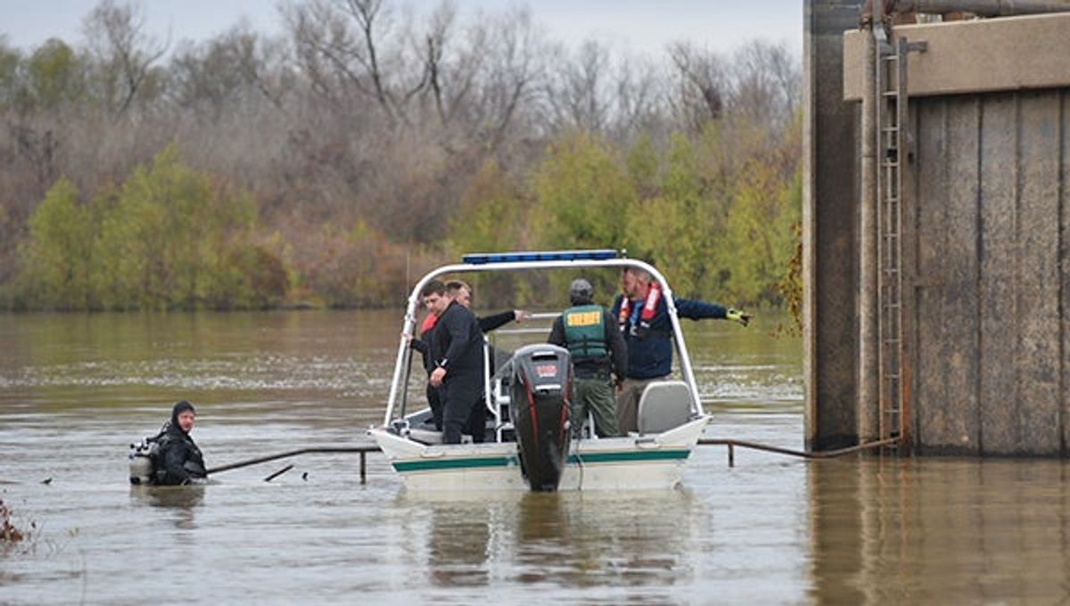 Fight at riverfront leads to arrest, search for car in water