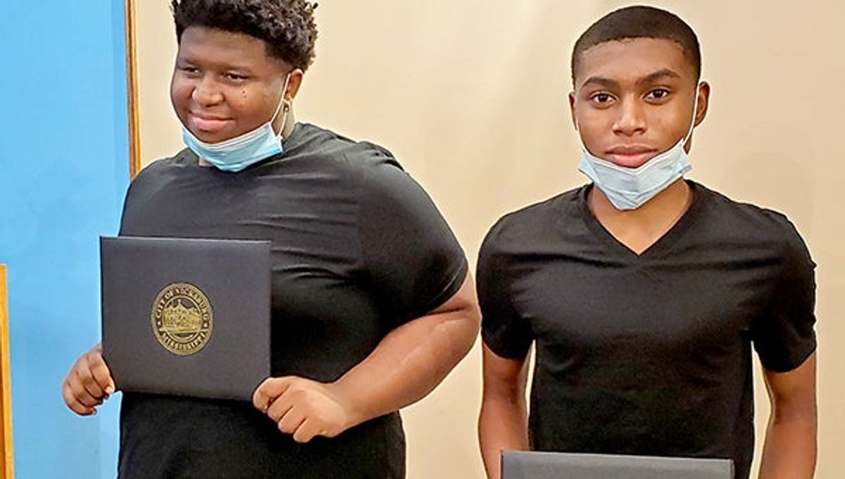 Young men honored by city for good deed in returning wallet