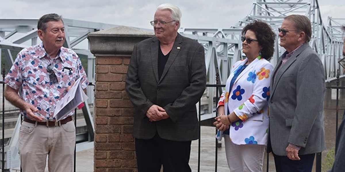 Saluting a hero: WWII veteran honored with flag-raising ceremony