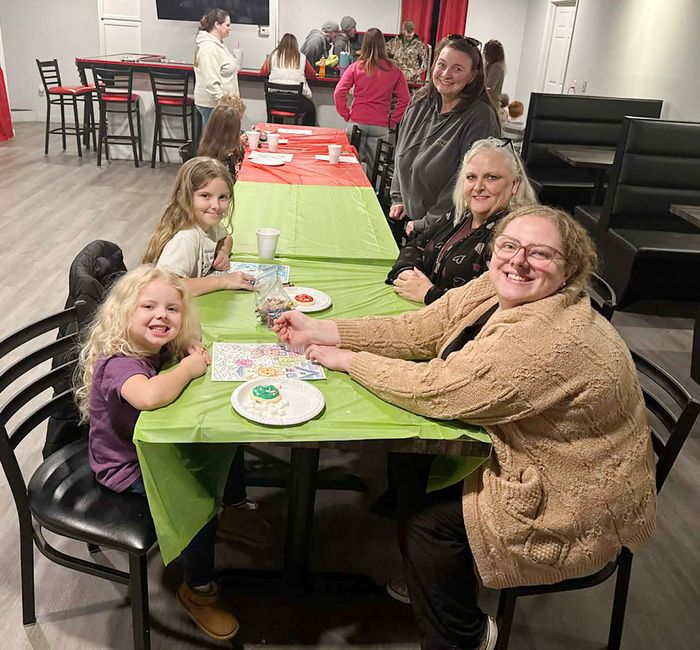 Holiday cheer fills Cooter as kids share cookies and photos with Santa