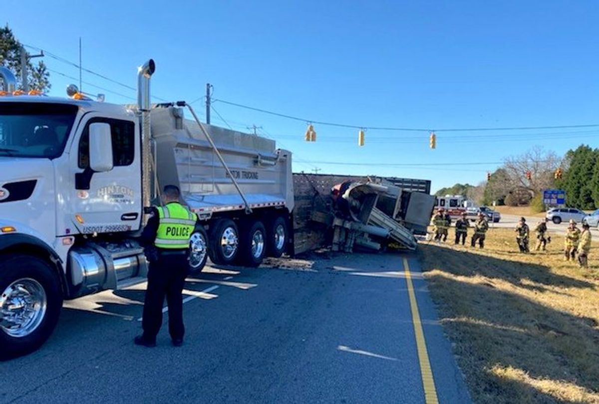 Tractor-trailer wreck closes road