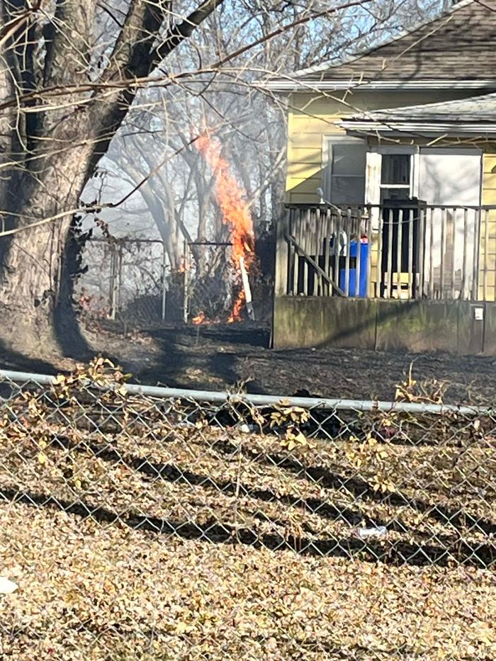 Backyard fire started as trash burn, neighbor reports